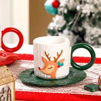 China Embossed Ceramic Tea Cup Christmas Style with Custom Logo Santa Claus and Tree Pattern for sale