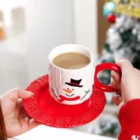 China Embossed Ceramic Tea Cup Christmas Style with Custom Logo Santa Claus and Tree Pattern for sale