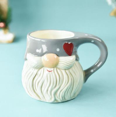 China Custom Christmas Ceramic Mug 3D Santa Design 350ml Holiday Coffee Cup Custom Color for sale