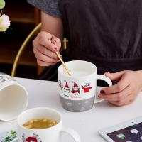 China Ceramic Custom Logo 14oz Christmas Coffee Mug Funny Santa Design Cups for Kids Gifts for sale