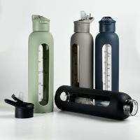 China 700ml 1000ml BPA Free Glass Sport Water Bottle with Straw and Silicone Sleeve for sale