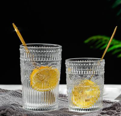 China 380ml Retro Embossed Gold Border Glass Mug Sunflower Embossed Water Drinking Cup for sale