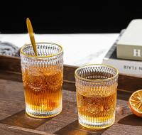 China 380ml Retro Embossed Gold Border Glass Mug Sunflower Embossed Water Drinking Cup for sale