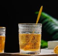 China 380ml Retro Embossed Gold Border Glass Mug Sunflower Embossed Water Drinking Cup for sale