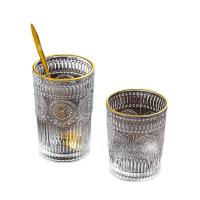 China 380ml Retro Embossed Gold Border Glass Mug Sunflower Embossed Water Drinking Cup for sale