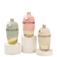 China 420ml Glass Rabbit Water Bottle with Silicone Sleeve and Straw for Kids for sale