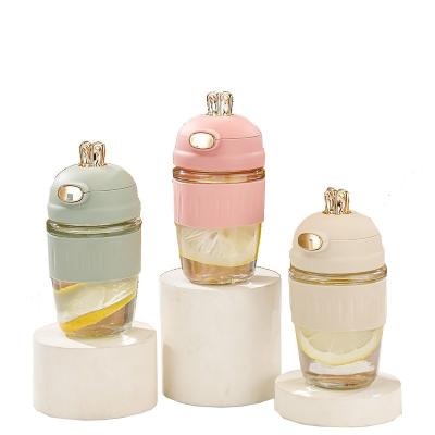 China 420ml Glass Rabbit Water Bottle with Silicone Sleeve and Straw for Kids for sale