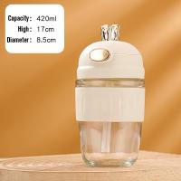 China 420ml Glass Rabbit Water Bottle with Silicone Sleeve and Straw for Kids for sale
