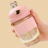 China 420ml Glass Rabbit Water Bottle with Silicone Sleeve and Straw for Kids for sale
