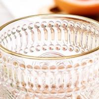 China OEM Retro Embossed Sunflower Tumbler Glass Heat Resistant Water Cup 300ML 380ML for sale