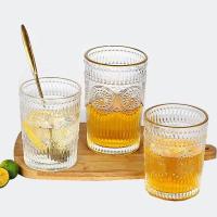 China Transparent Gold Rim Sunflower Glass Water Cup 300ML 380ML Retro Embossed Mug for sale