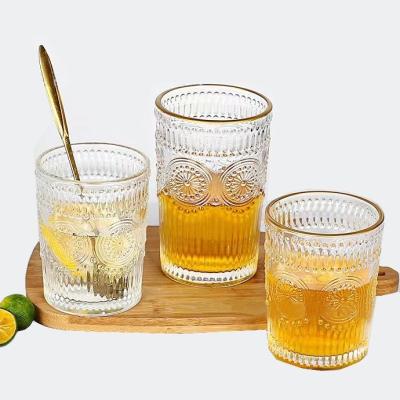 China Transparent Gold Rim Sunflower Glass Water Cup 300ML 380ML Retro Embossed Mug for sale