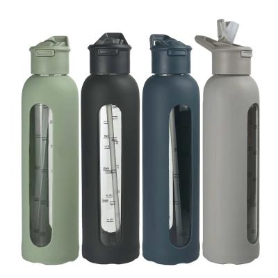 China Motivational Glass Water Bottle 700ml 1000ml with Silicone Sleeve Time Marker Reminder for sale