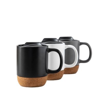 China 450ml Custom Logo Matte Black White Cork Base Ceramic Coffee Travel Mug with PP Lid for sale