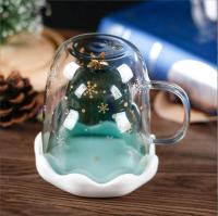 China Christmas Holiday Double Wall Borosilicate Glass Water Cup 300ml with Handle Lid for sale