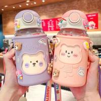 China Anti-Corrosion Coated 620ml Plastic Water Bottle with Bear Lid and Lanyard Cute for sale