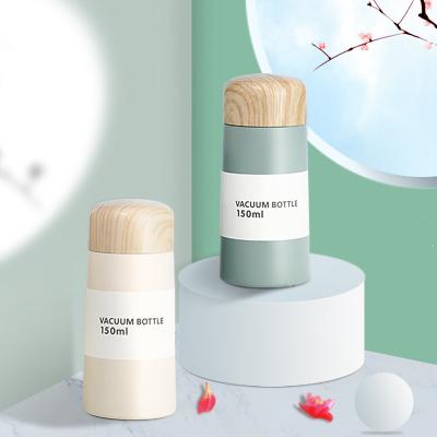 China Mini Stainless Steel Vacuum Bottle 150ml 250ml Double Wall Wood Grain Thermos Cup for sale