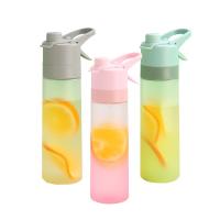 China Custom Logo Outdoor Bicycle Cycling Water Bottle with 650ML Capacity and Spray Function for sale