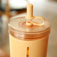 China 700ml Clear BPA Free Plastic Water Bottle Tumbler Cup with Straw and Sleeve for sale
