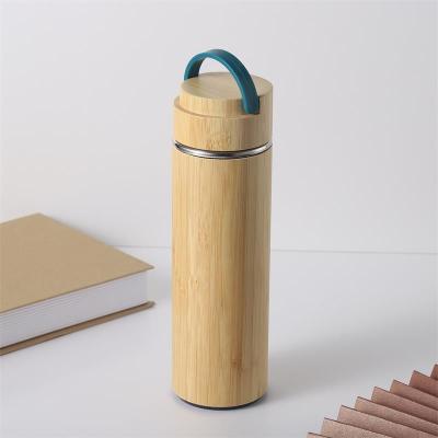 China Eco-Friendly Bamboo Handle 304 Stainless Steel Vacuum Insulated Tea Bottle 500ml for sale