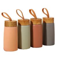 China 304 Stainless Steel Vacuum Insulated Water Bottle 280ml Portable Wood Grain Design for sale