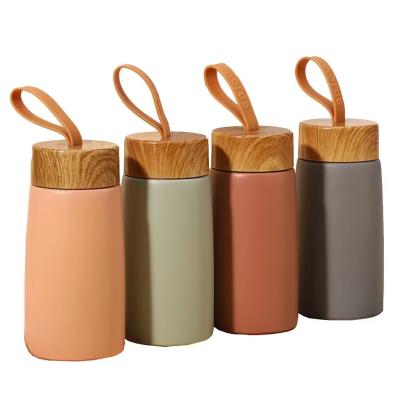China 304 Stainless Steel Vacuum Insulated Water Bottle 280ml Portable Wood Grain Design for sale