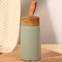 China 304 Stainless Steel Vacuum Insulated Water Bottle 280ml Portable Wood Grain Design for sale