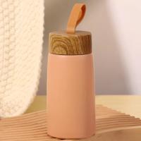 China 304 Stainless Steel Vacuum Insulated Water Bottle 280ml Portable Wood Grain Design for sale