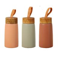 China 280ml 304 Stainless Steel Insulated Water Bottle with Wood Grain Finish Custom Logo Kids Sports Cup for sale