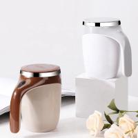China Portable 380ml Magnetic Rotary Electric Stainless Steel Coffee Mug with 6-12 Hour Thermal Insulation for sale