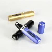 China Unisex Round Shape Fancy Mini Bottom Fill Refillable Aluminum Perfume Oil Bottles Set Pump Perfume Atomizer for sale