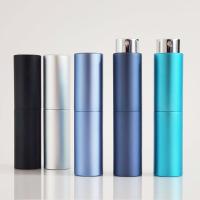 China NEW Round White Marble Pattern Velvet Bag 8ml 10ml Aluminum Twist up Refillable Travel Perfume Atomizer for sale