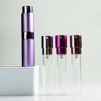 China 8ml 10ml 15ml 20ml Unique Metal Round Black Pocket Travel Mist Wedding Gift Atomiser Parfum Spray Bottle for sale