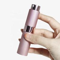 China Stripe Aluminum 8ml Twist up Travel Refillable Atomiser Cologne Dispenser Luxury Perfume Spray Bottle for sale
