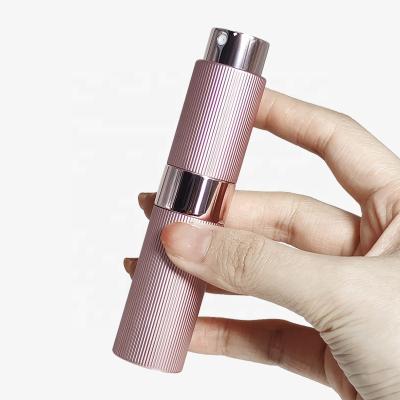 China Stripe Aluminum 8ml Twist up Travel Refillable Atomiser Cologne Dispenser Luxury Perfume Spray Bottle for sale