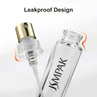 China Custom Made Small Clear Crimp Neck Round 10ml Thick Bottom Empty Glass Perfume Bottle With Atomizer for sale