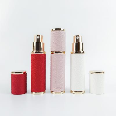 China Custom Luxury 10ml 15ml Cosmetic Cologne Packaging Travel Case Leather Perfume Bottle With Atomizer Pump for sale