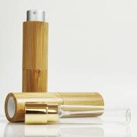China Empty 10ml 20ml 8ml Refillable Portable Liquid Container Bamboo Plastic Perfume Atomizer Spray Bottle for sale