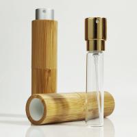 China Empty 10ml 20ml 8ml Refillable Portable Liquid Container Bamboo Plastic Perfume Atomizer Spray Bottle for sale