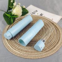 China 8ml Plastic Rotating Elegant Blue Cologne Dispenser Triangle Empty Fragrance Atomizer Glass Perfume Bottle for sale