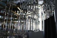 China Lacquered Burnished Finish Brass Crystal Chandelier Tiered Round Chandelier With 91cm Diameter for sale