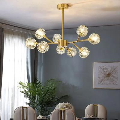 China Luxury Brass Body Crystal Shade Chandelier with Adjustable Height for Modern Living Rooms for sale