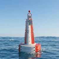 China Heavy-duty Ø2600 offshore navigation buoy with 6000kg buoyancy, galvanized steel tower, LLDPE float body and SC160 lantern compatibility. OEM options available. for sale