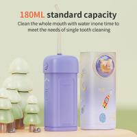 China 2 Modes Purple Oral Irrigator Water Flosser IPX7 Water Resistant for sale