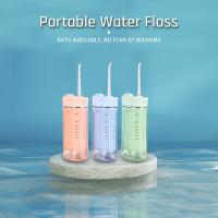 China 225ml Mini Portable Adjustable Oral Irrigator  Power Dental Water Flosser for sale