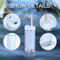 China Customized IPX7 Mini Water Flosser With 225ml Pumping Tank With 1100mAh Battery for sale