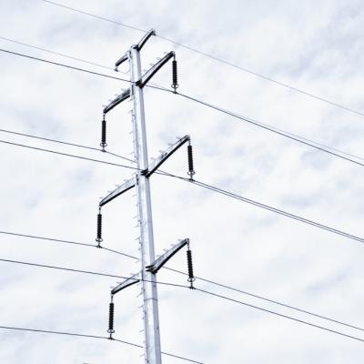 China Hongxin Overhead Line Galvanized Suspension Steel Pole Q460 Transmission Pole With Crossarms for sale