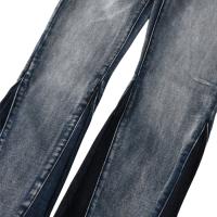 China Flare Patchwork Denim Jeans Mid Rise Streetwear Denim Pants With Whisker Detailing for sale