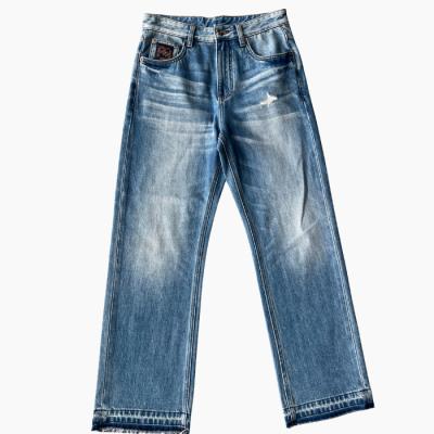 China Horizon Faded Men's Jeans Ripped Raw Hem Wide Leg Jeans Mid Waist for sale