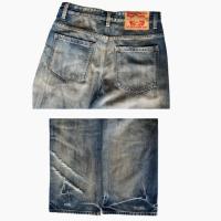 China Sandblast Men's Jeans Flare Bootcut Distressed Denim Jeans Frayed Rip for sale